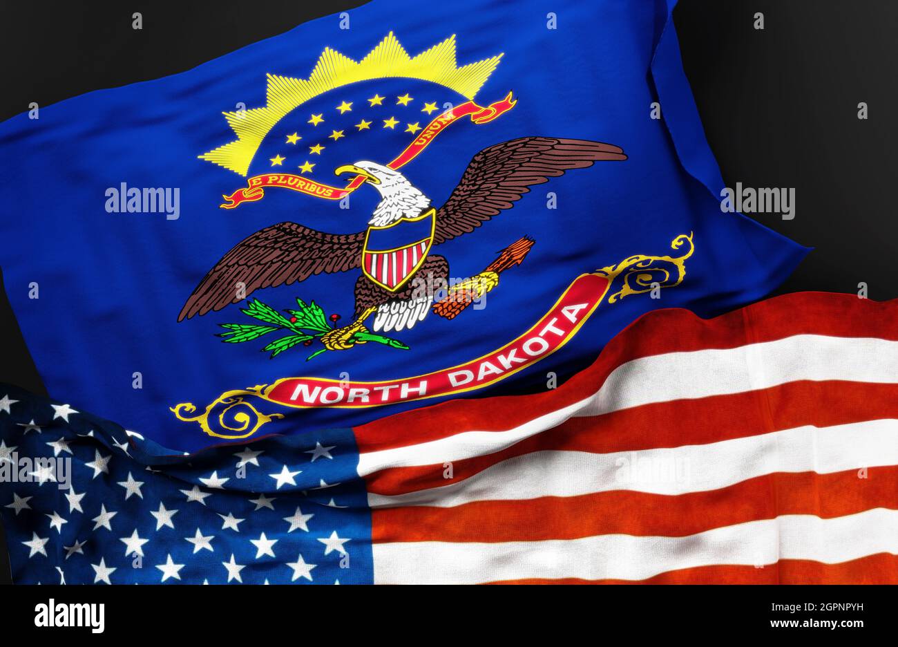 Flag of North Dakota along with a flag of the United States of America ...