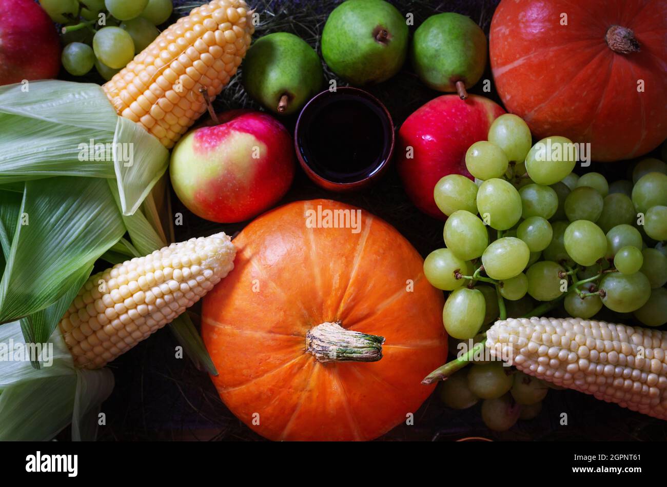 Kwanzaa Afro-American holiday. Corn, bowl and harvest Stock Photo - Alamy
