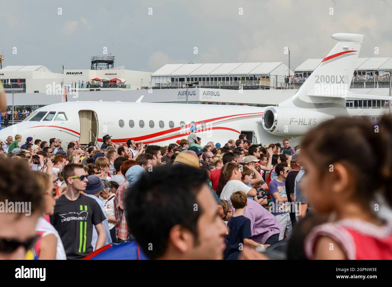 Airshow crowd. Audience at the Farnborough International Airshow 2014 ...