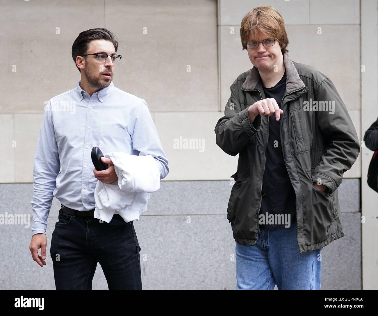 Joseph Olswang (left) and Alexander Peat arrives at Westminster ...