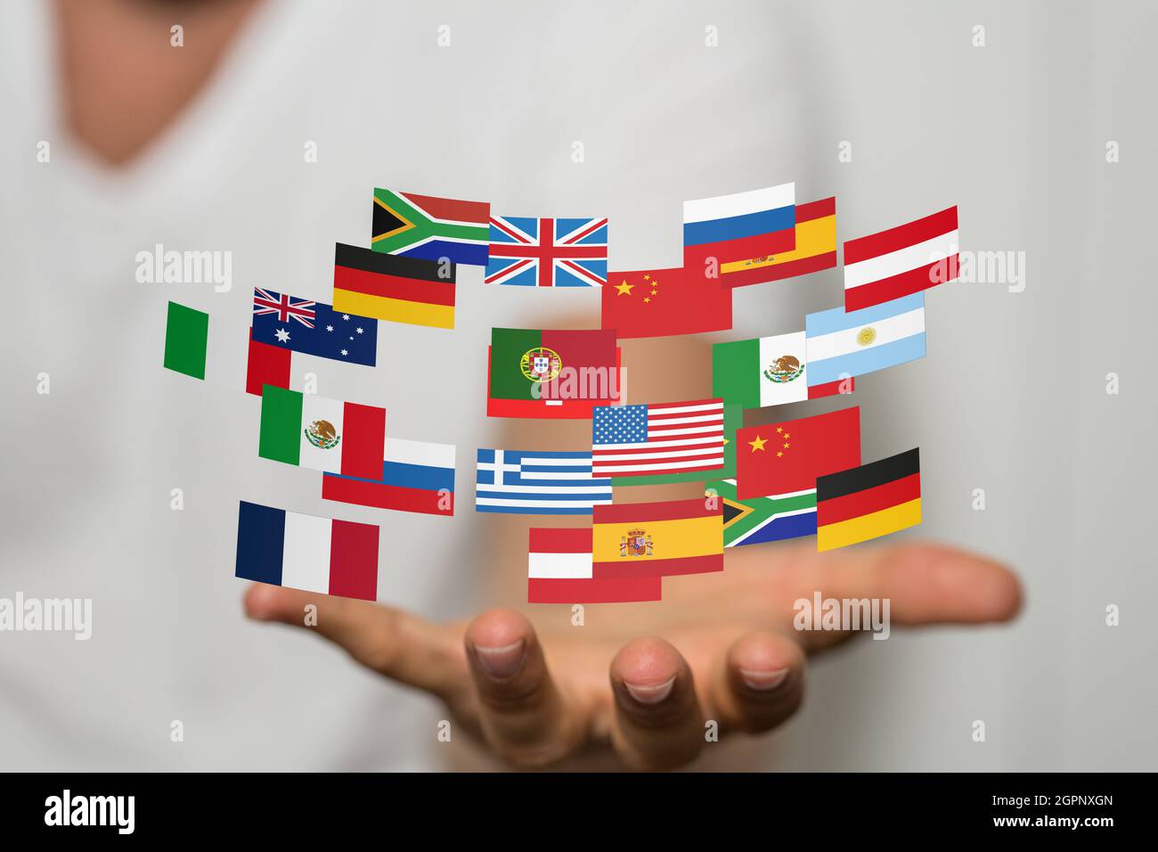 3D rendering of various countries flags in a hand Stock Photo - Alamy
