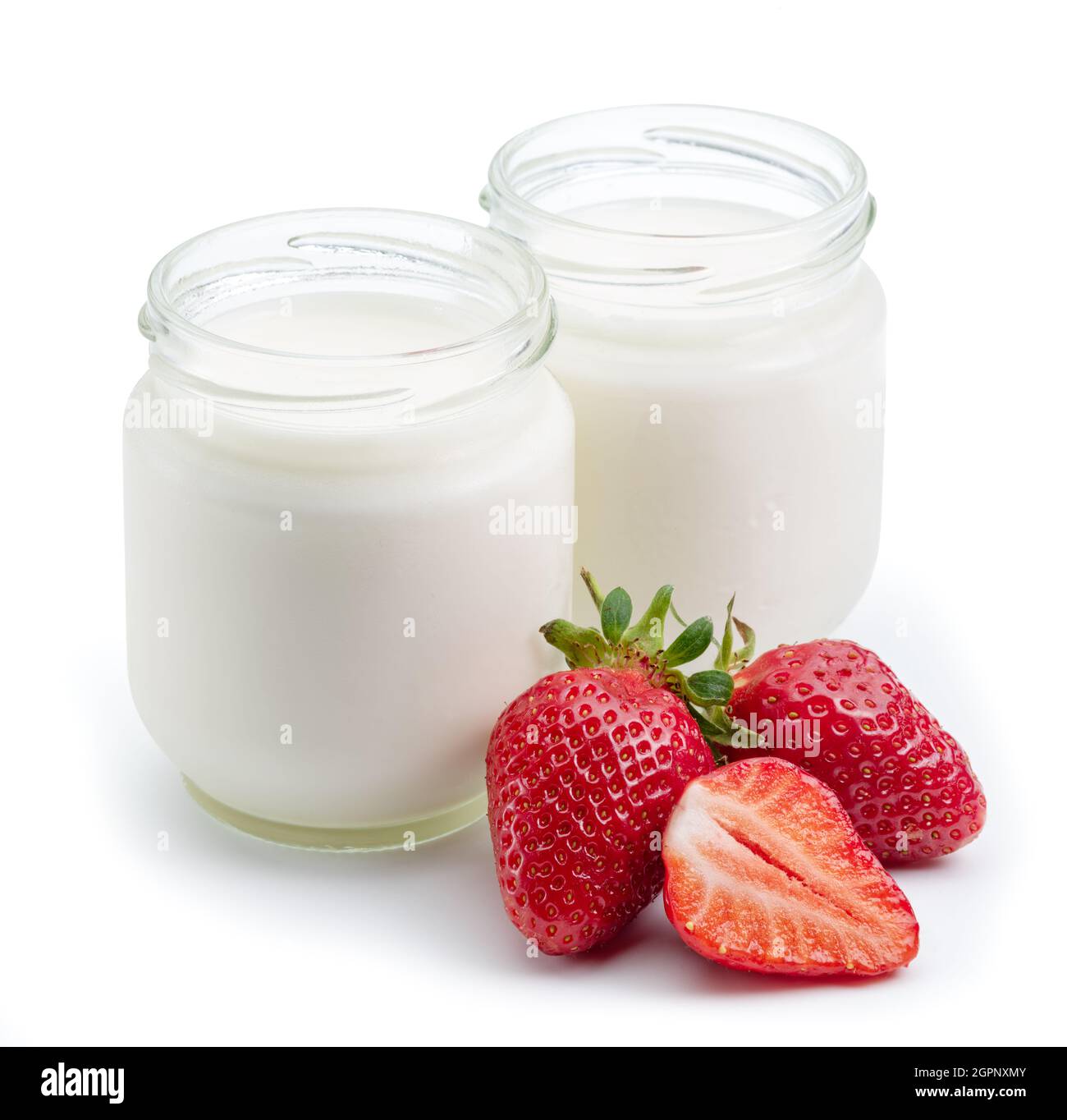 Two glass containers with plain yoghurt and berries isolated on white ...