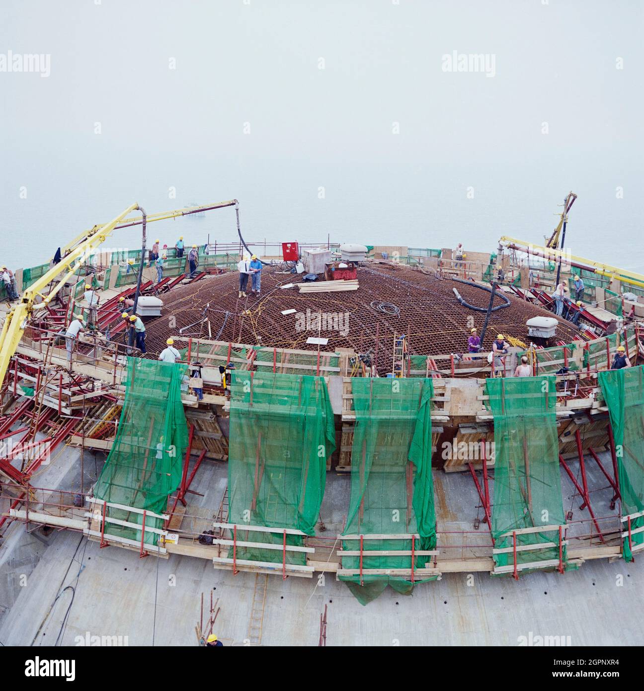 Laing workers concreting the top of the reactor dome during the ...