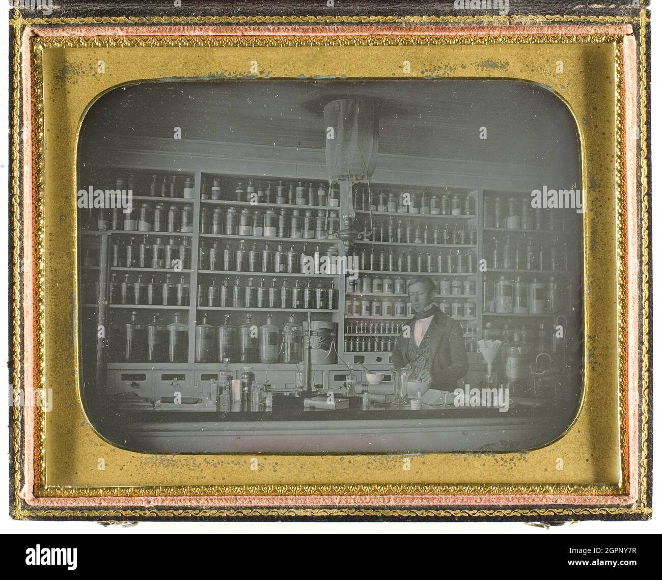 S. P. Peck Apothecary, c. 1850. Pharmacist preparing drugs in pestle ...