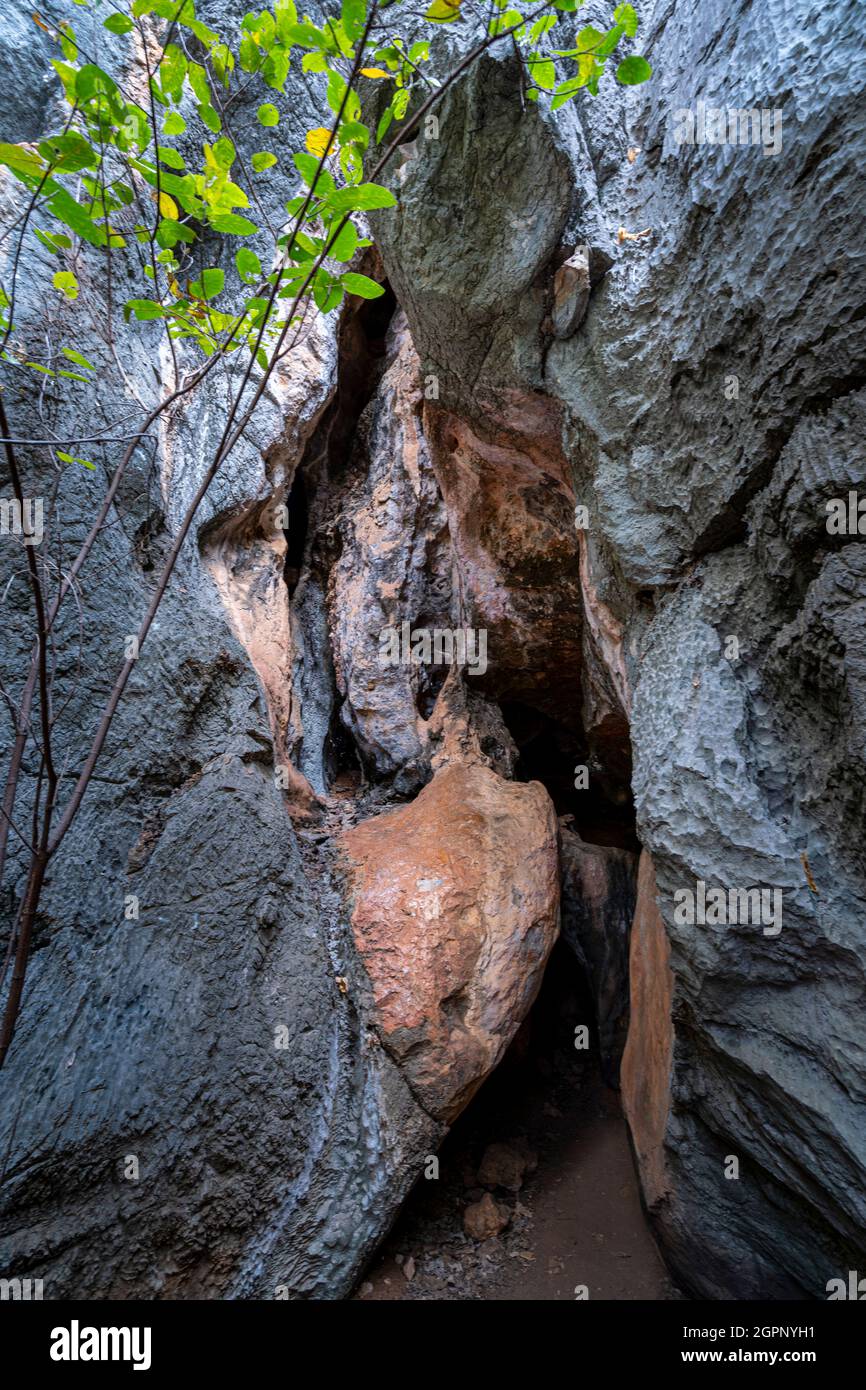 Crevice entrance to cave at Mungana Rock Art site, Chillagoe-Mungana ...