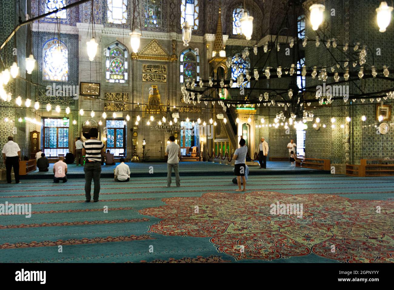 Istanbul, Turkey; May 27th 2013: Muslims praying in the New Mosque ...