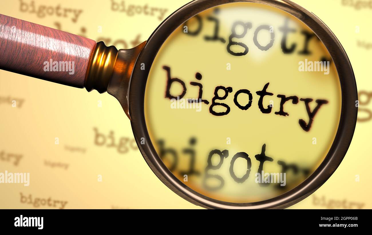 Bigotry and a magnifying glass on English word Bigotry to symbolize ...