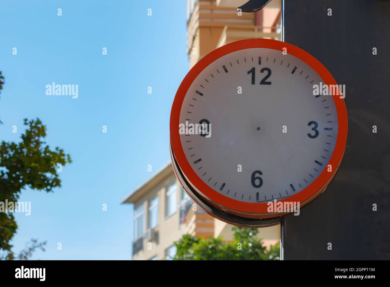 A clock without clock hands in the street. Timeless concept. Public ...