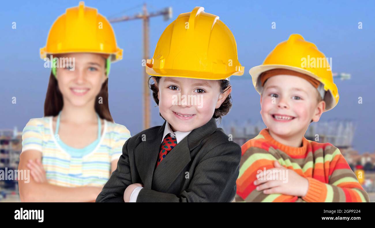 Team of small workers on the construction site Stock Photo - Alamy