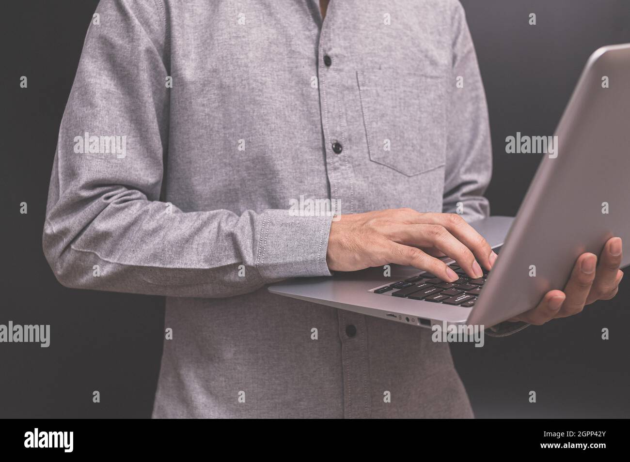 Business people use notebook computers for work Stock Photo - Alamy