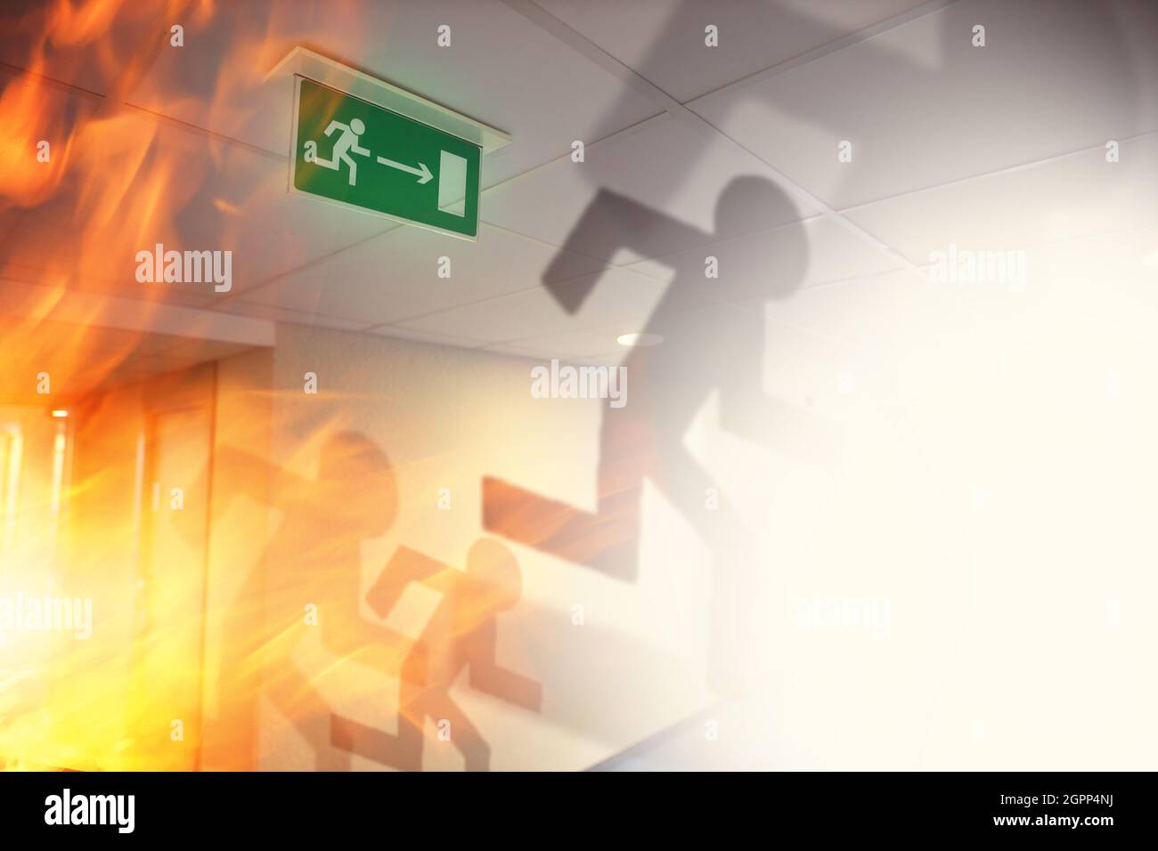 emergency exit abstraction and fire in the workplace Stock Photo - Alamy