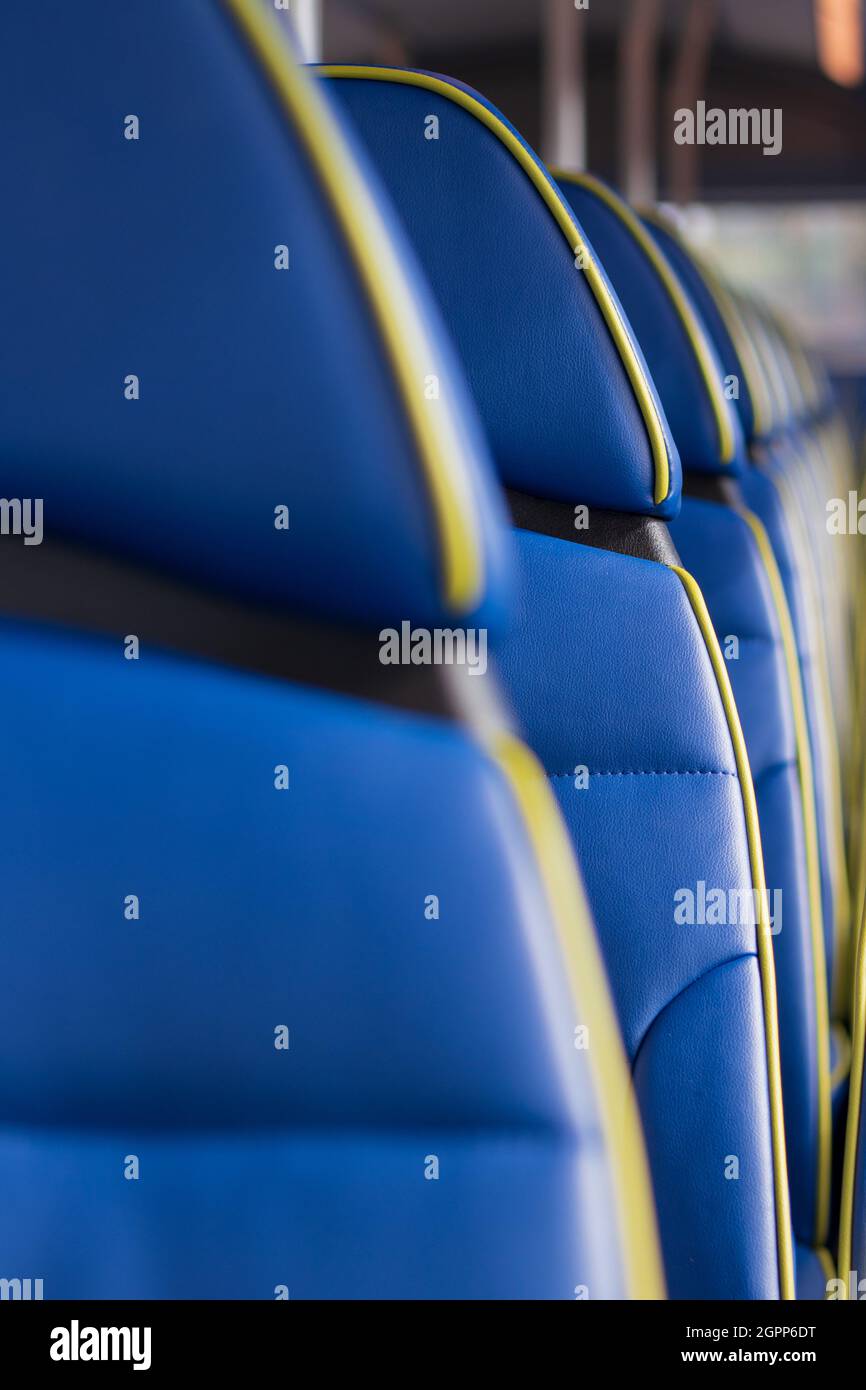 Blue seats on a bus travelling through the streets of Manchester Stock ...