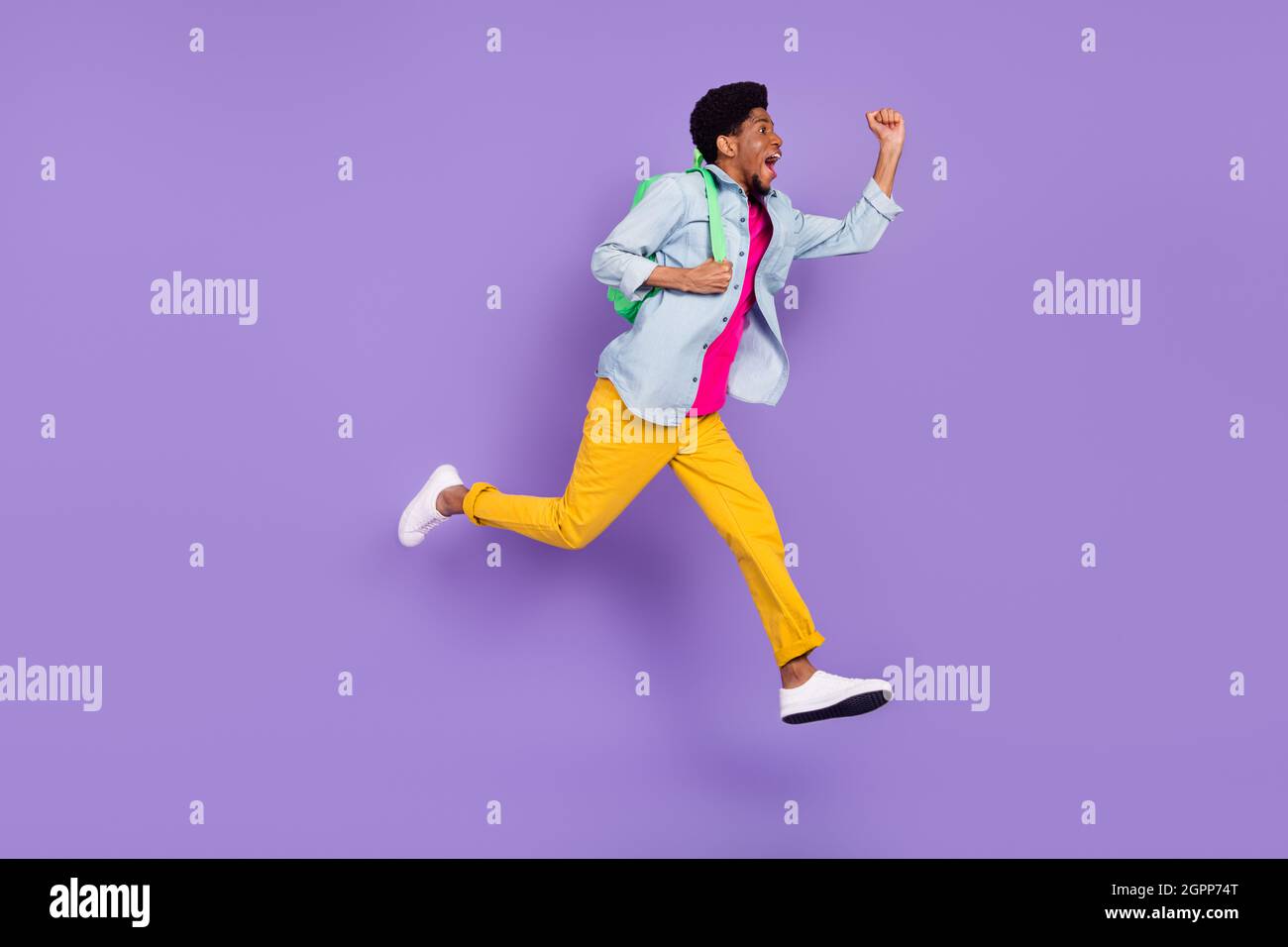 Profile photo of astonished guy jump scream goal wear rucksack blue ...