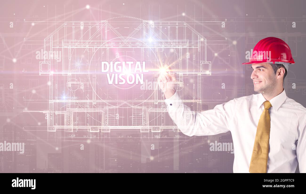 Handsome architect drawing with helmet Stock Photo - Alamy