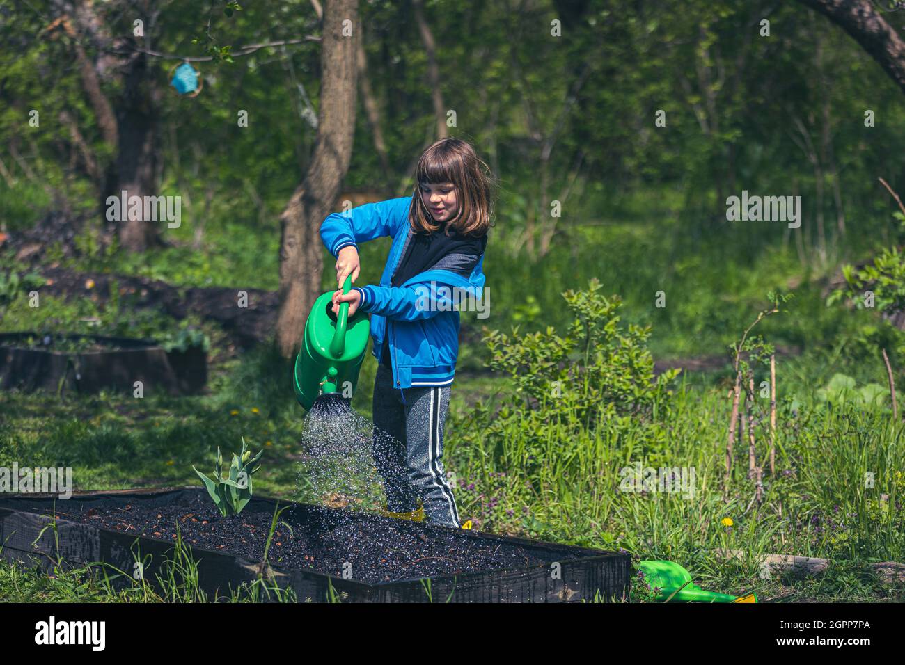 Kids in community garden hi-res stock photography and images - Alamy