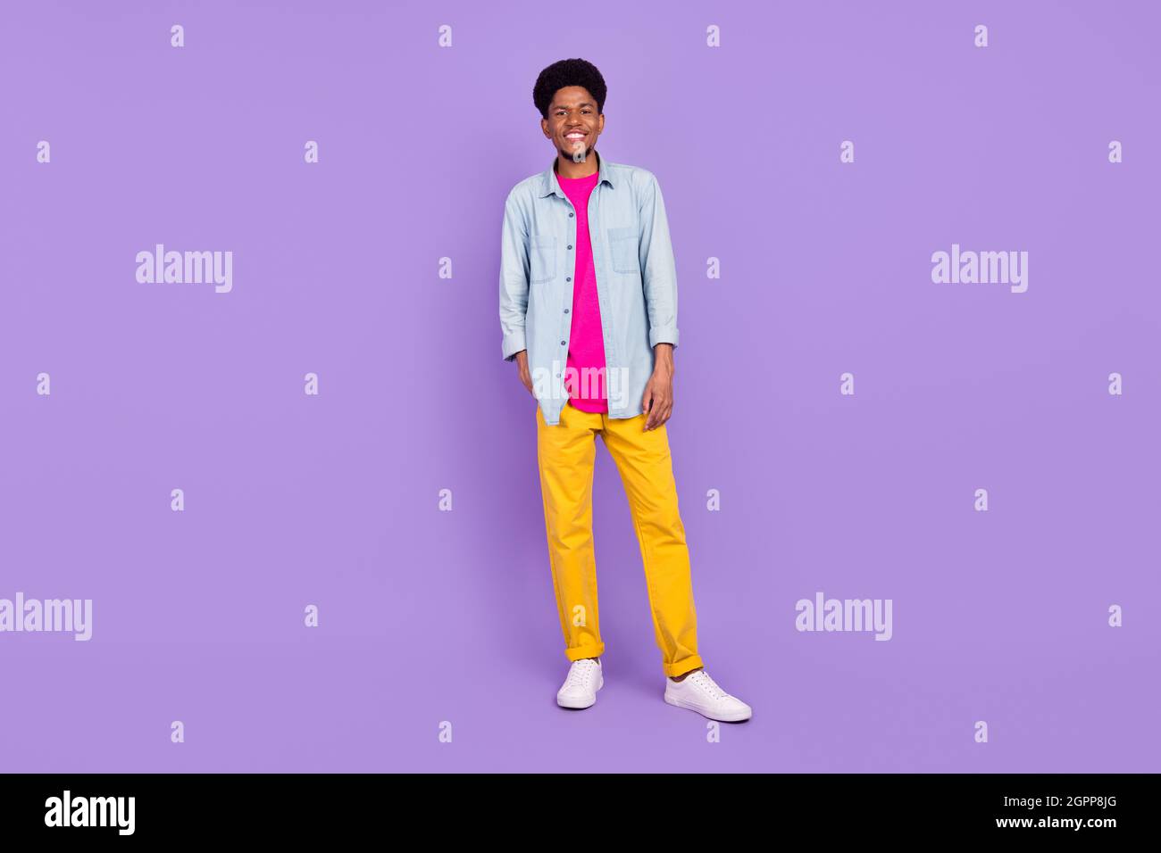 Photo of adorable cute dark skin guy dressed jeans shirt arm pocket ...