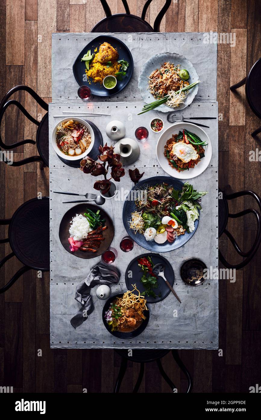 Table with authentic Thai menu dishes Stock Photo - Alamy
