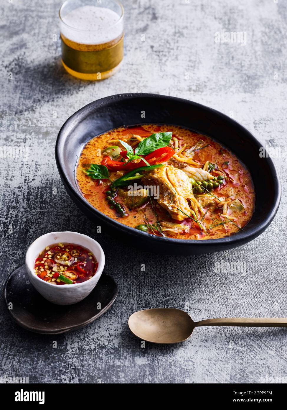 Gaeng Dang Bpla - red curry fish Stock Photo - Alamy