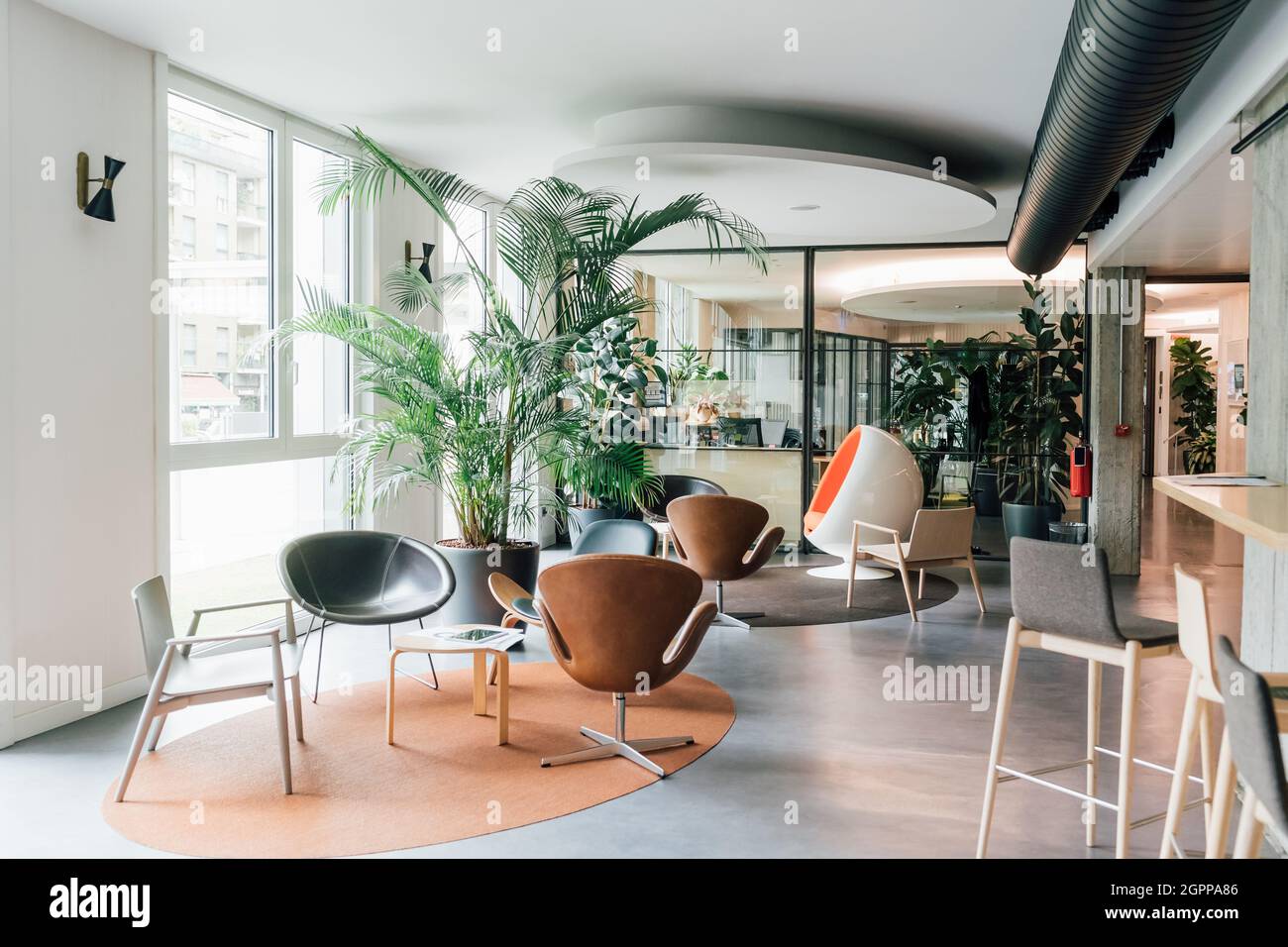 Italy, Interior of modern creative studio Stock Photo - Alamy