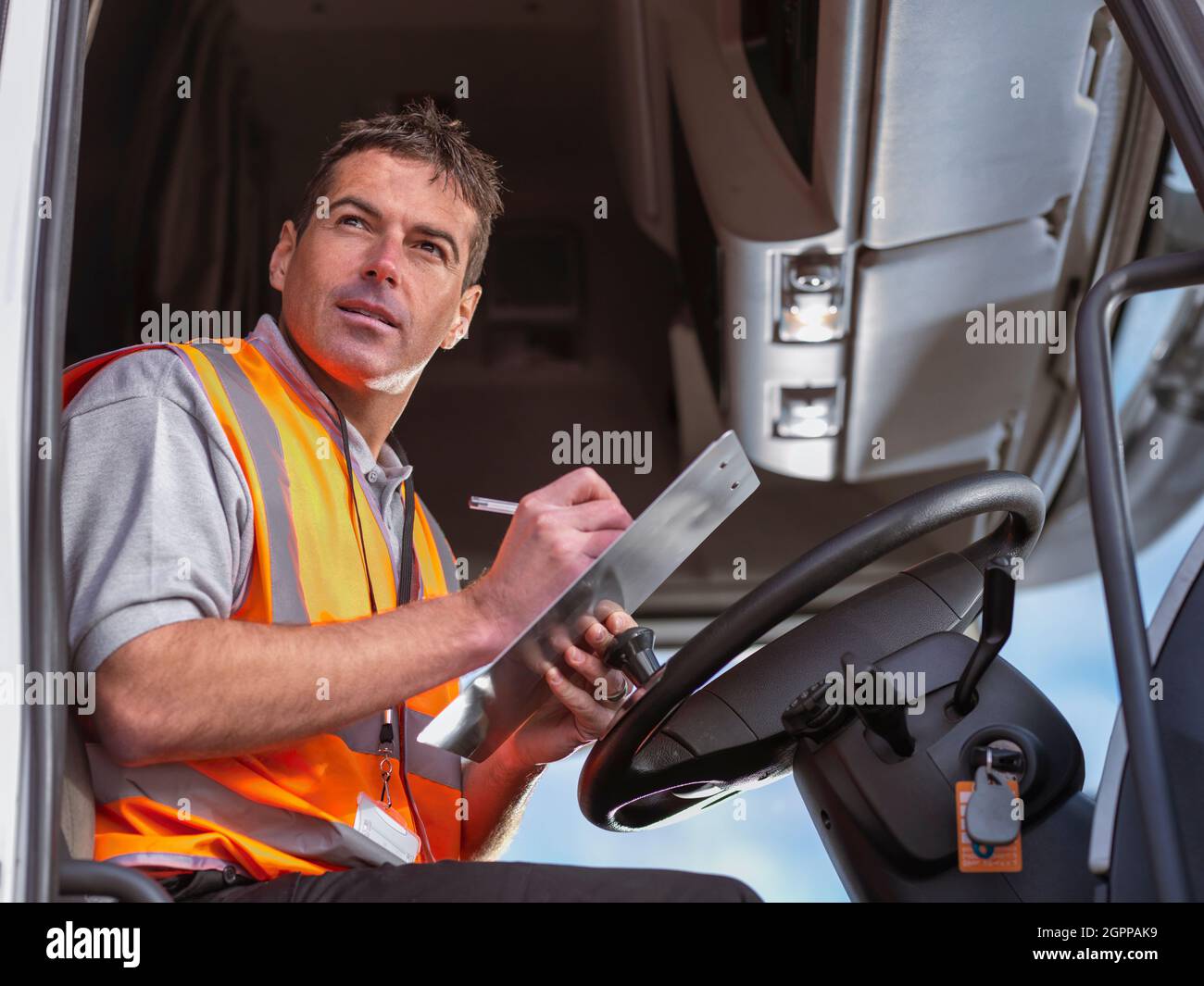Truck driver on steering wheel hi-res stock photography and images - Alamy