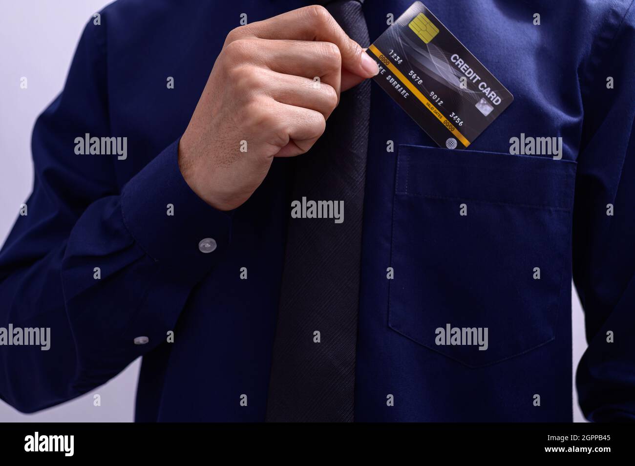 Business people hold credit cards Stock Photo - Alamy
