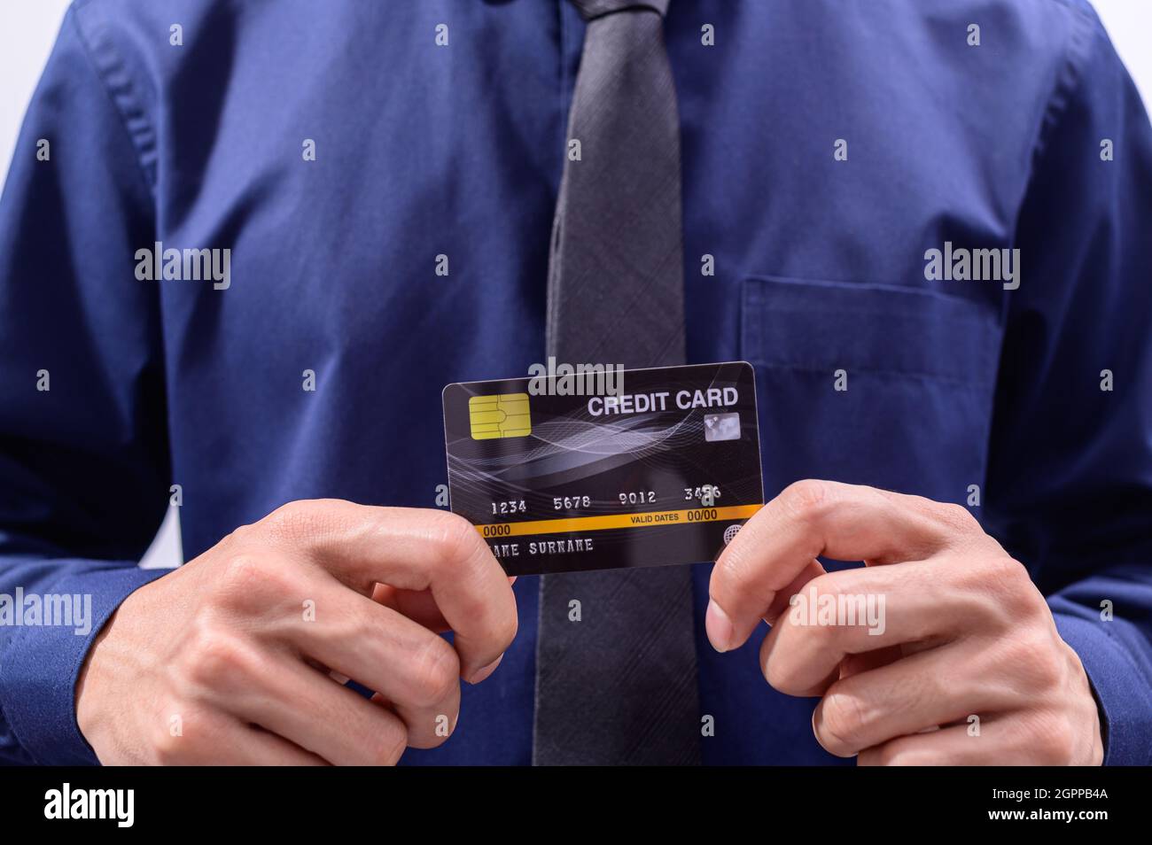 Business people hold credit cards Stock Photo - Alamy
