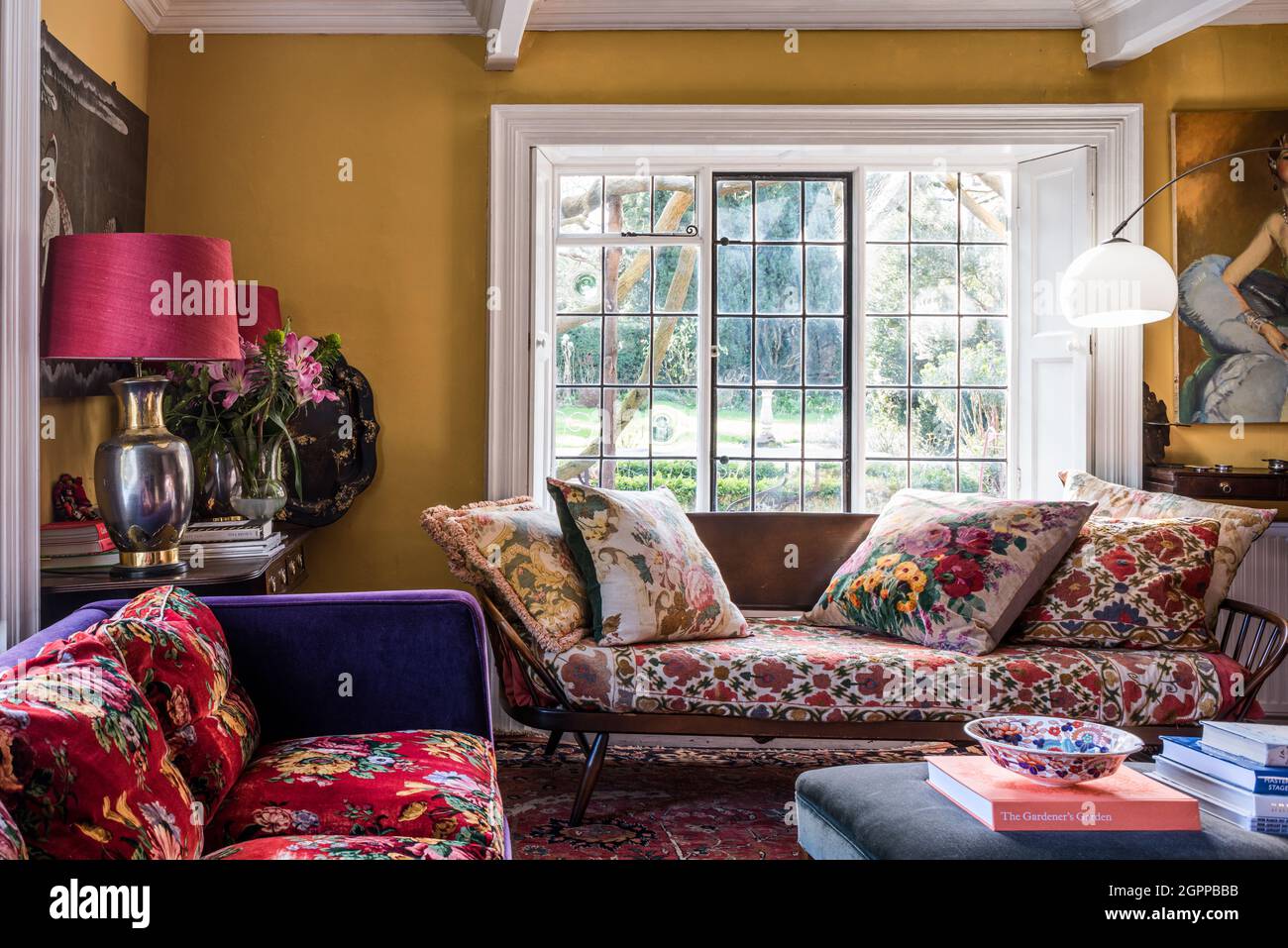 Ercol daybed with mix of bold colours and fabrics in Suffolk living ...