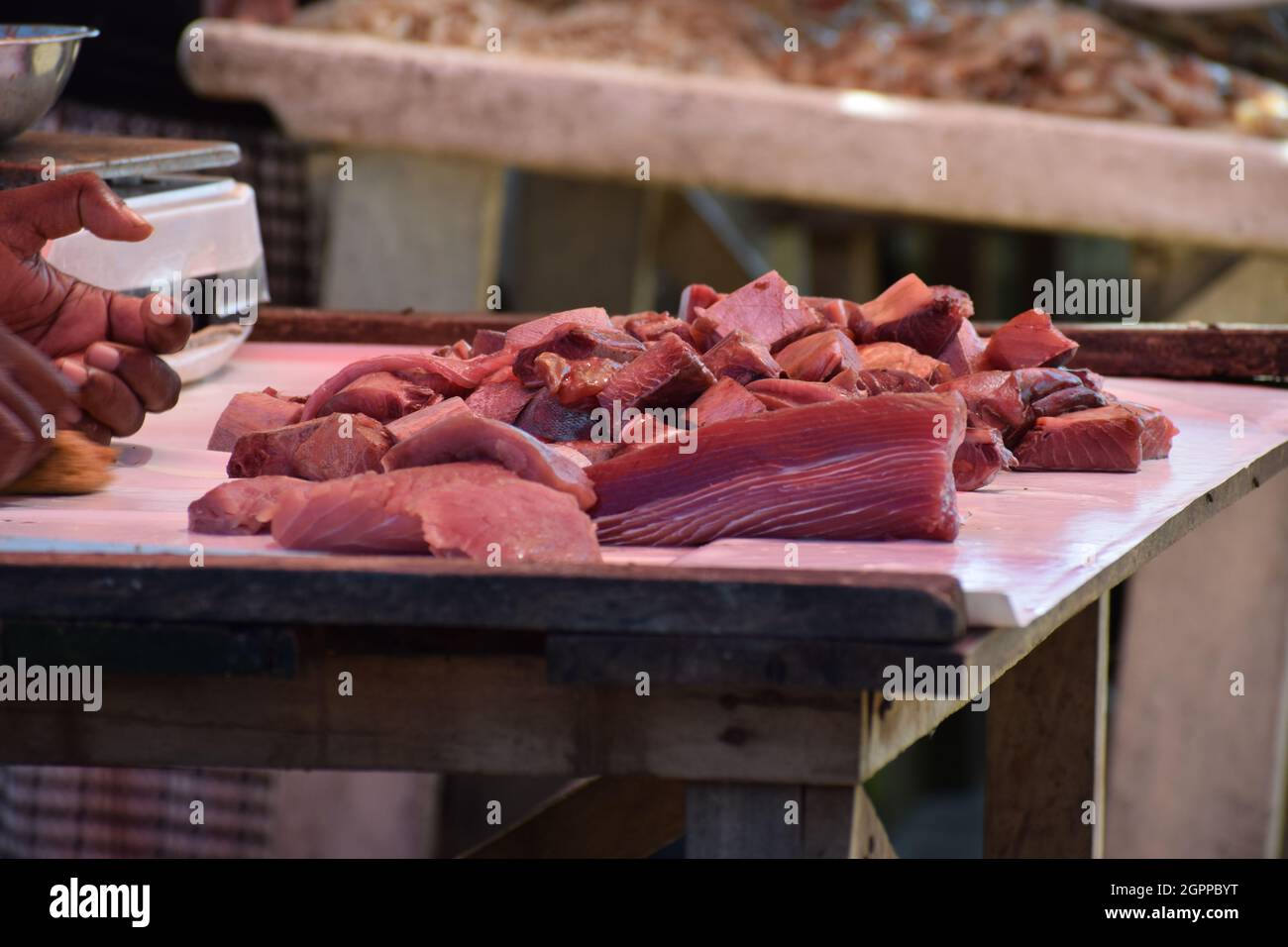 Fish selling procedure on open market Stock Photo - Alamy
