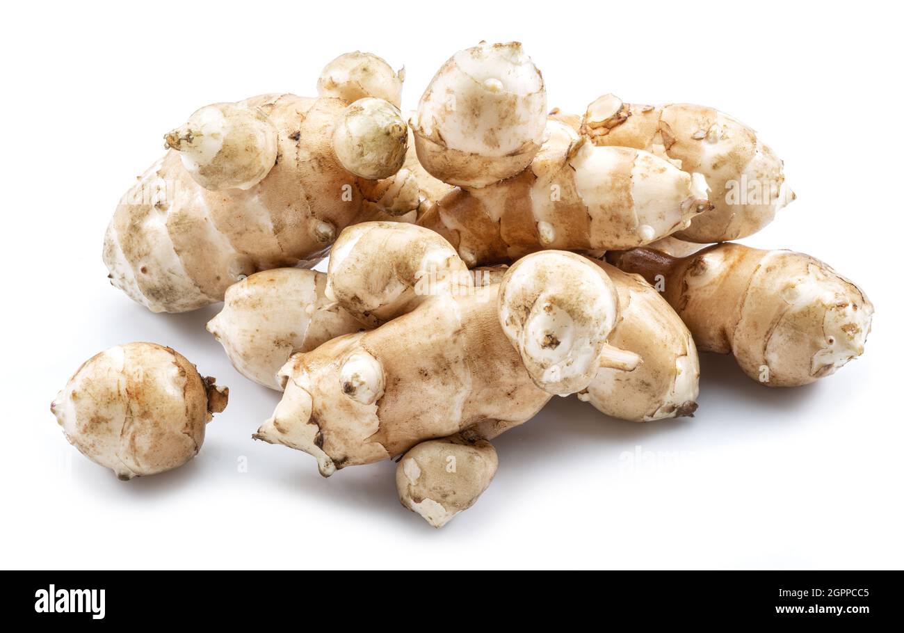 Jerusalem artichoke roots isolated on white background Stock Photo - Alamy