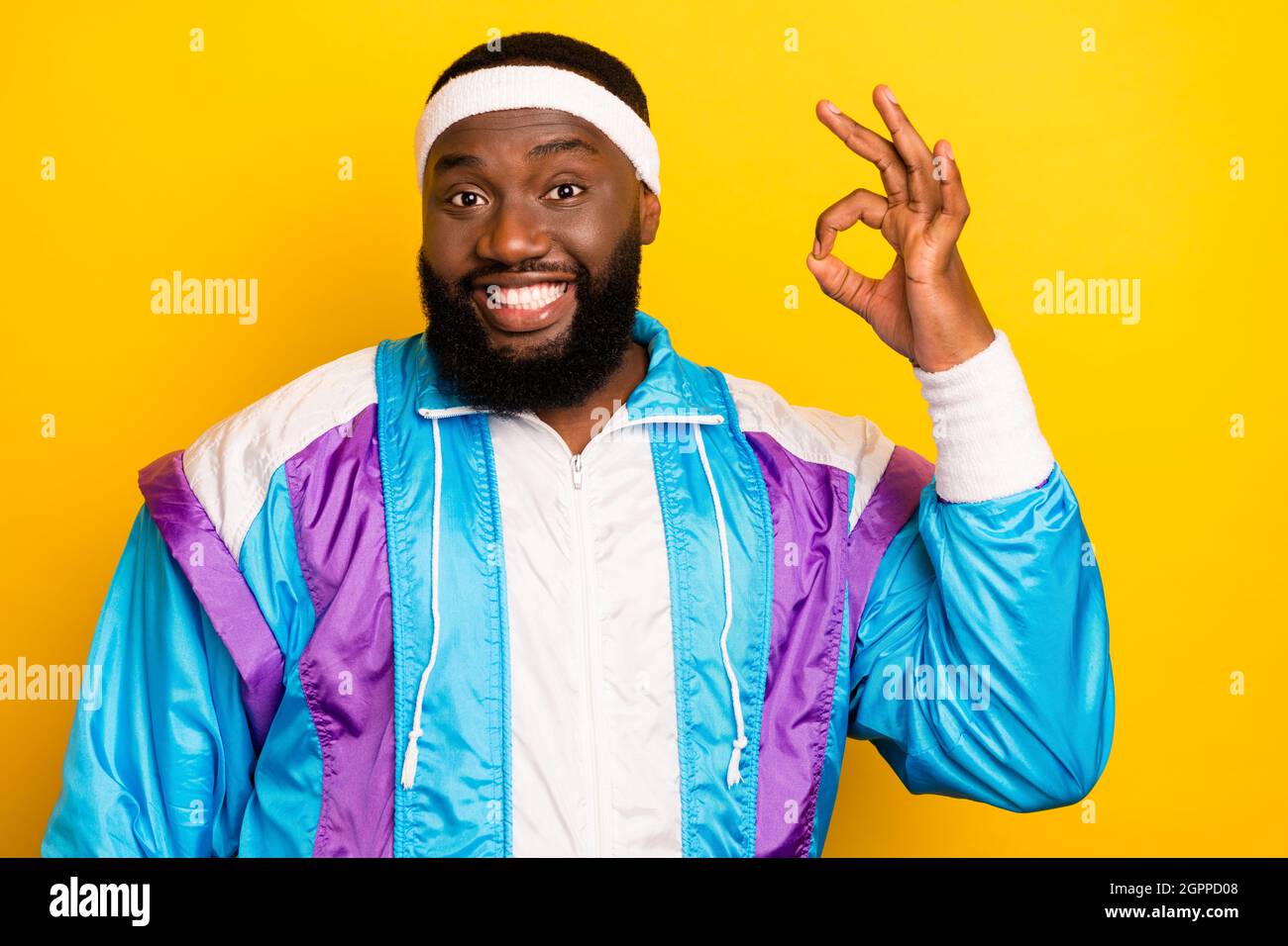 Photo of impressed pretty dark skin guy dressed sport suit headband ...