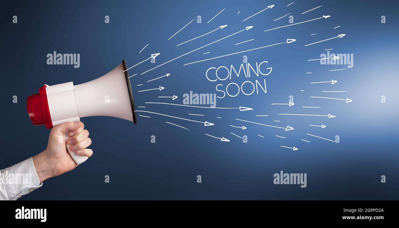 Young girl screaming to megaphone Stock Photo - Alamy