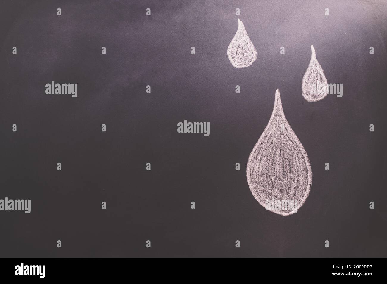 Water drop symbols written in chalk Stock Photo - Alamy