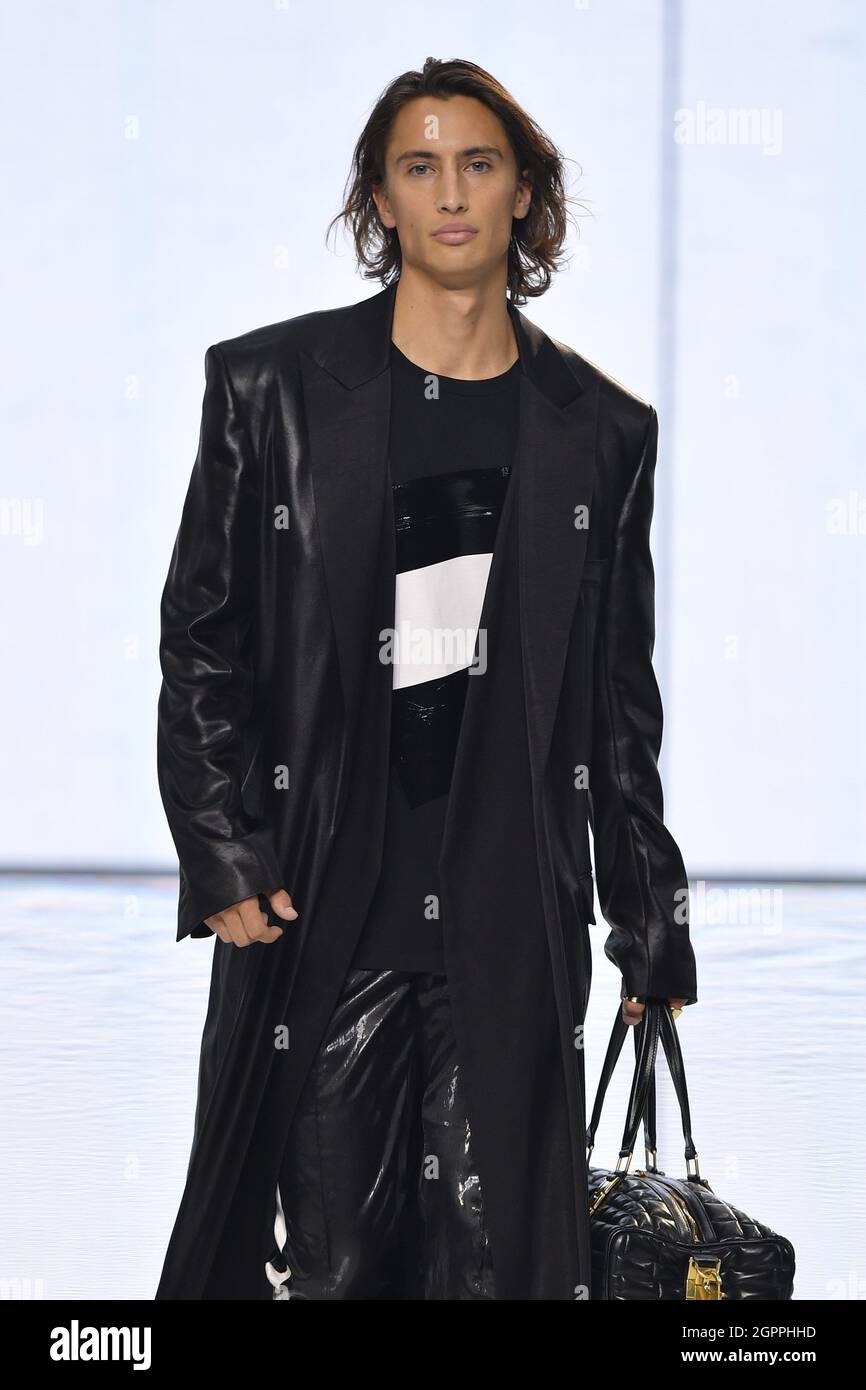 Model James Turlington walks on the runway at the Balmain fashion show ...