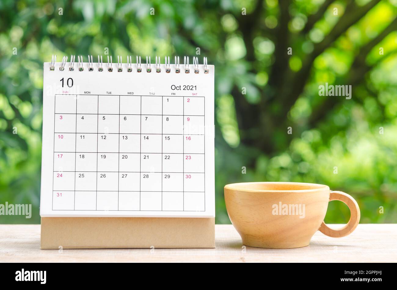 October 2021 Calendar desk for organizer to plan and reminder on wooden ...