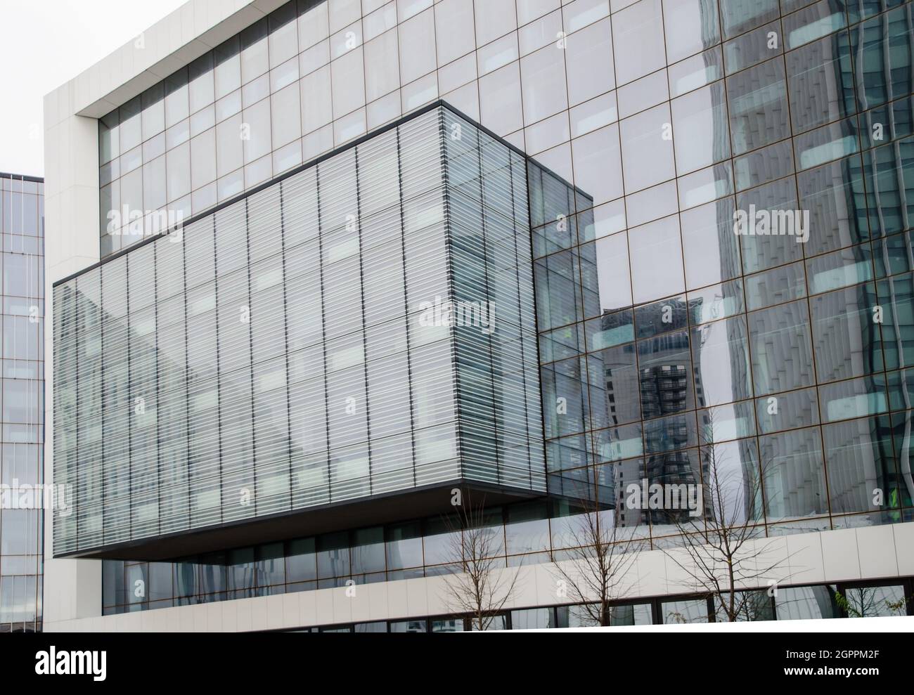 Facade of a modern glass and steel building in a financial district ...
