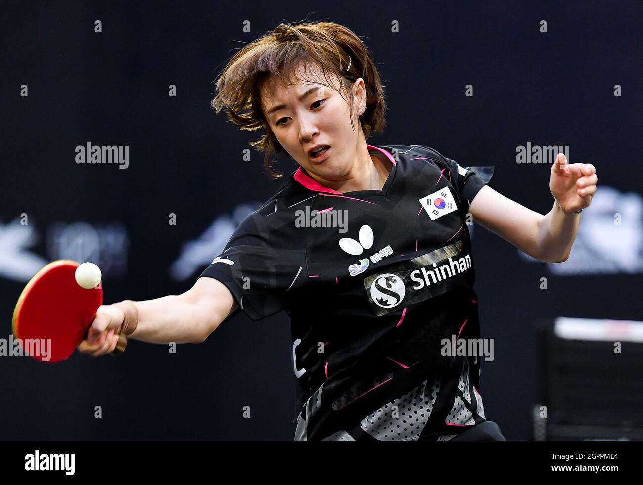 Doha, Qatar. 30th Sep, 2021. Suh Hyowon of South Korea competes against ...