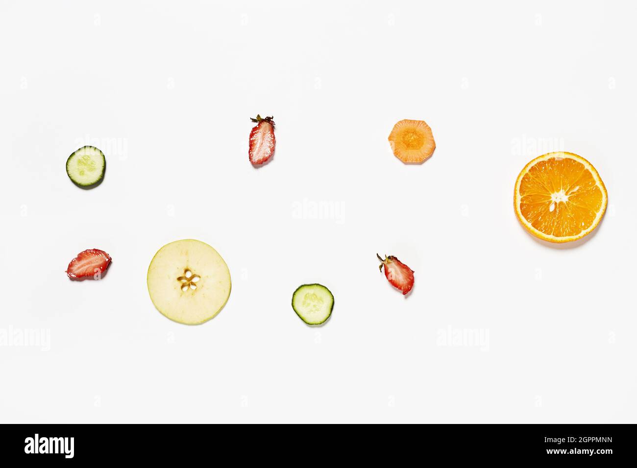 Cut fruits and vegetables isolated on white background Stock Photo - Alamy