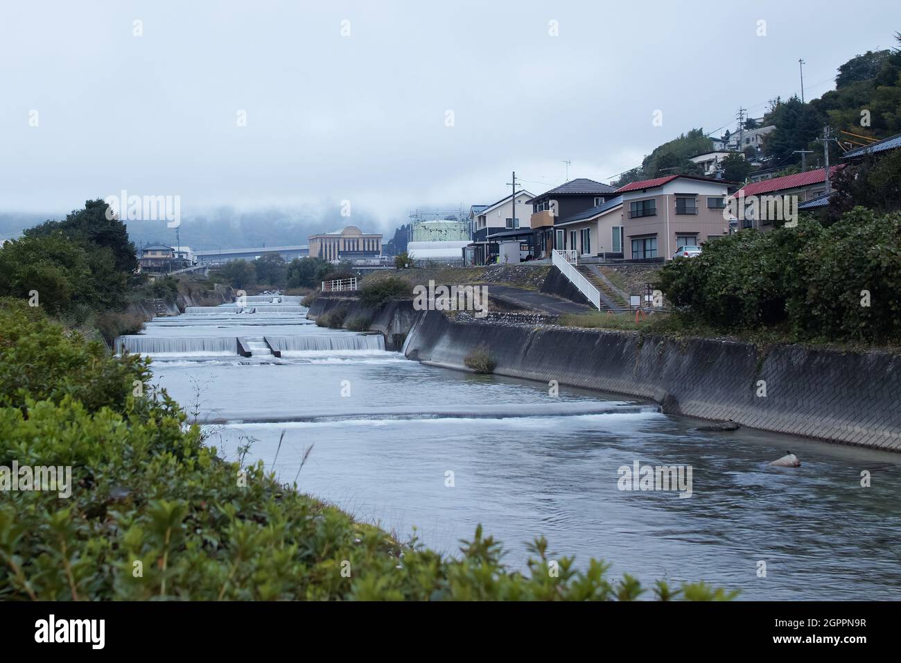Iida, Nagano, Japan, 2021-07-09 , Iida city and Matsukawa river, a city ...