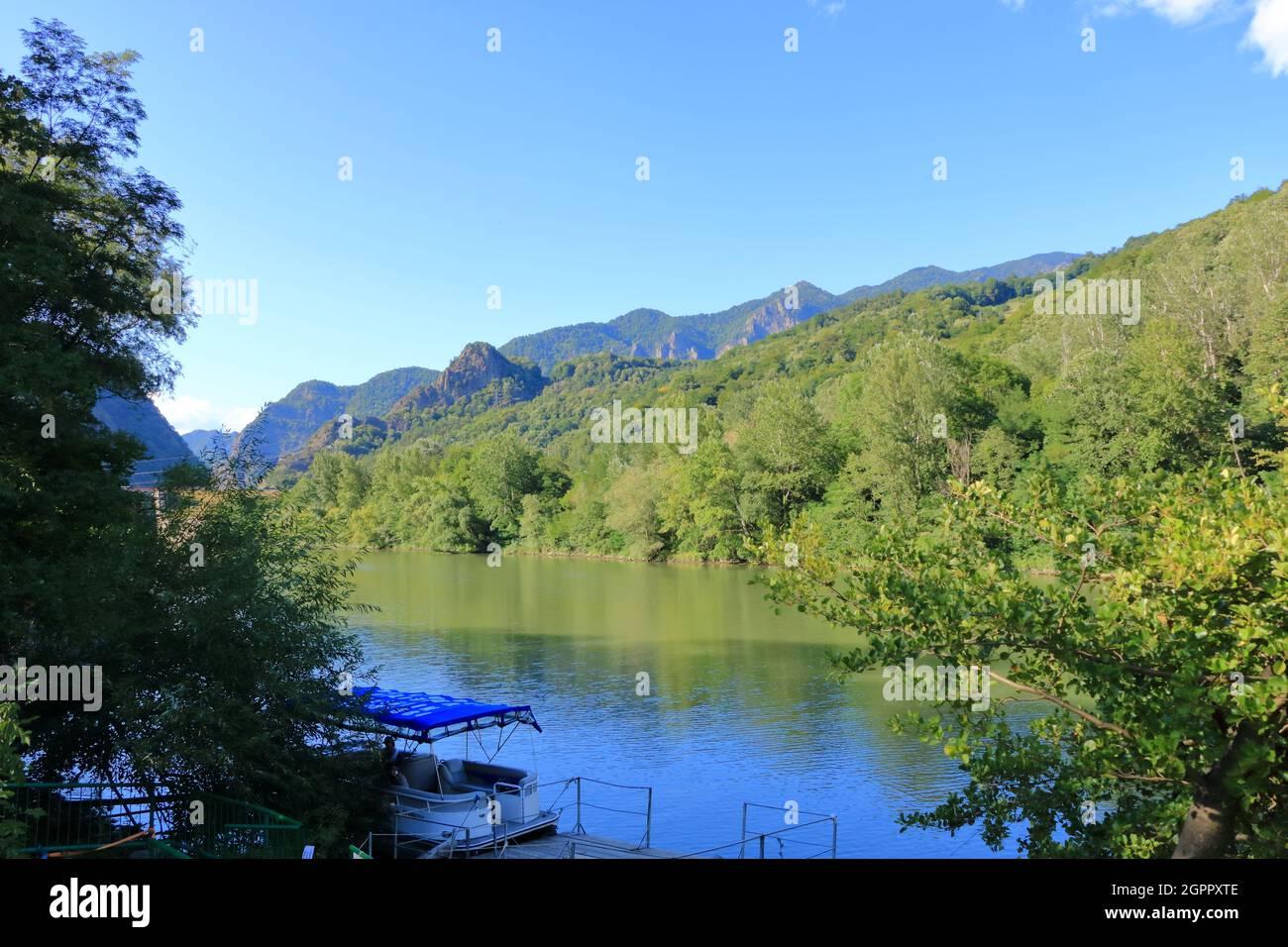 Landscape of Olt Valley with Olt river and the Cozia Mountains in ...