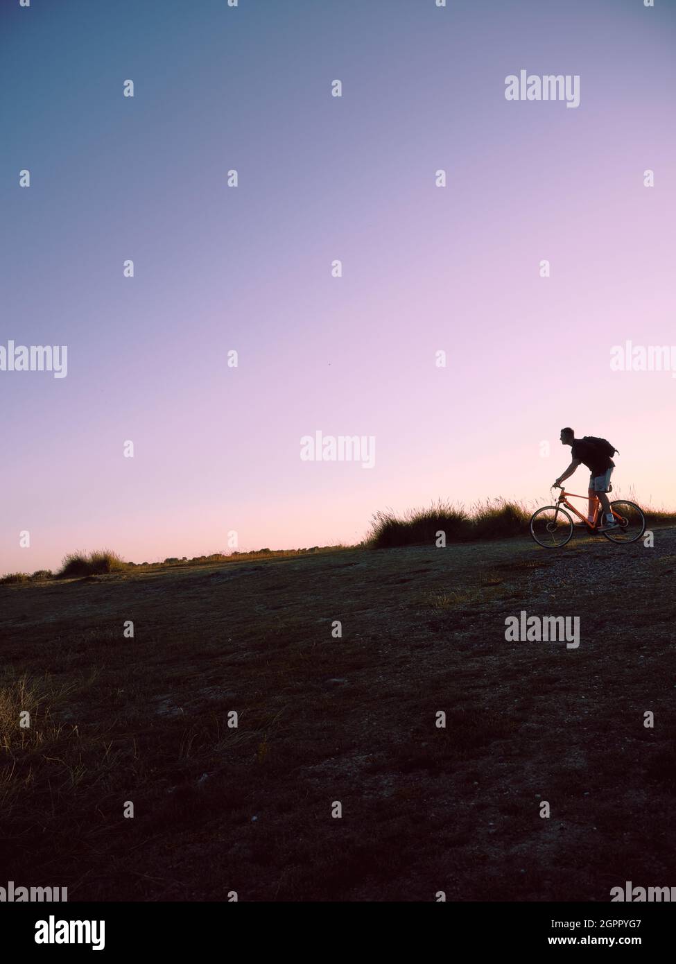 Minimal landscape cyclist hi-res stock photography and images - Alamy