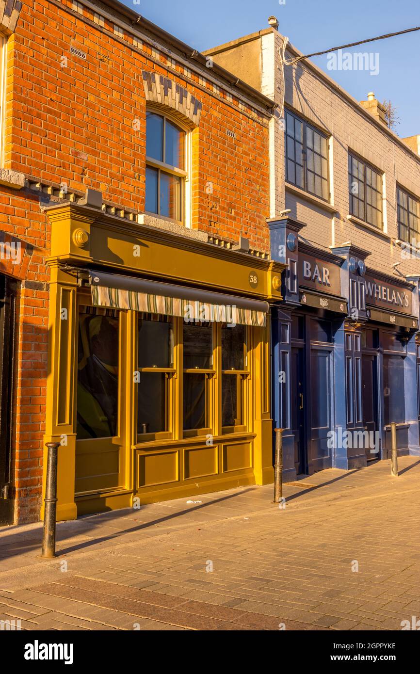 DUBLIN, IRELAND - Mar 17, 2021: Ireland, Dublin, a yellow building next ...