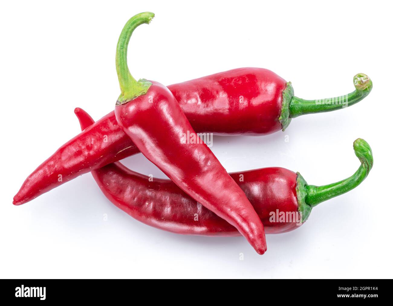 Fresh red chilli peppers isolated on white background Stock Photo - Alamy