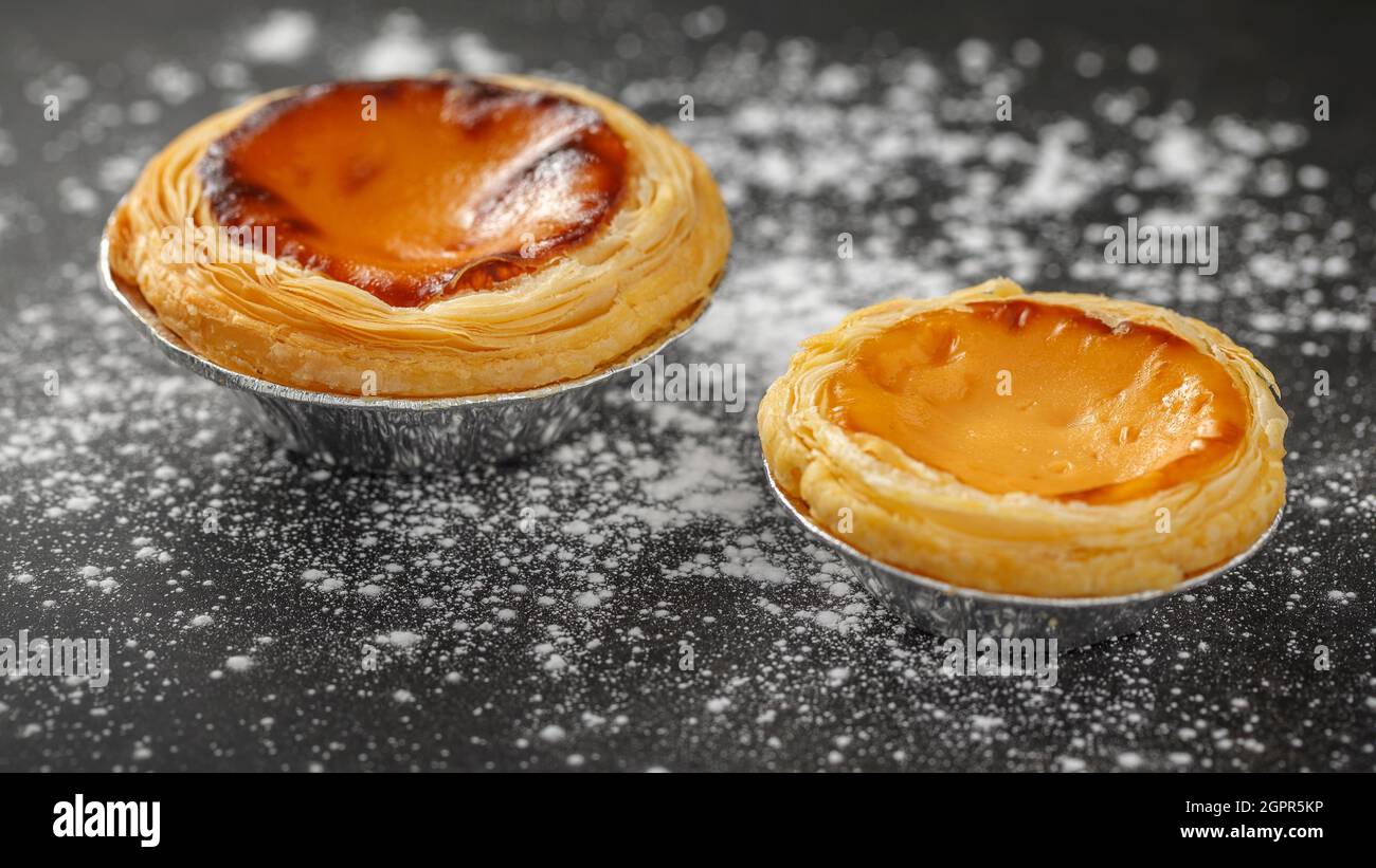 Two egg tarts hi-res stock photography and images - Alamy