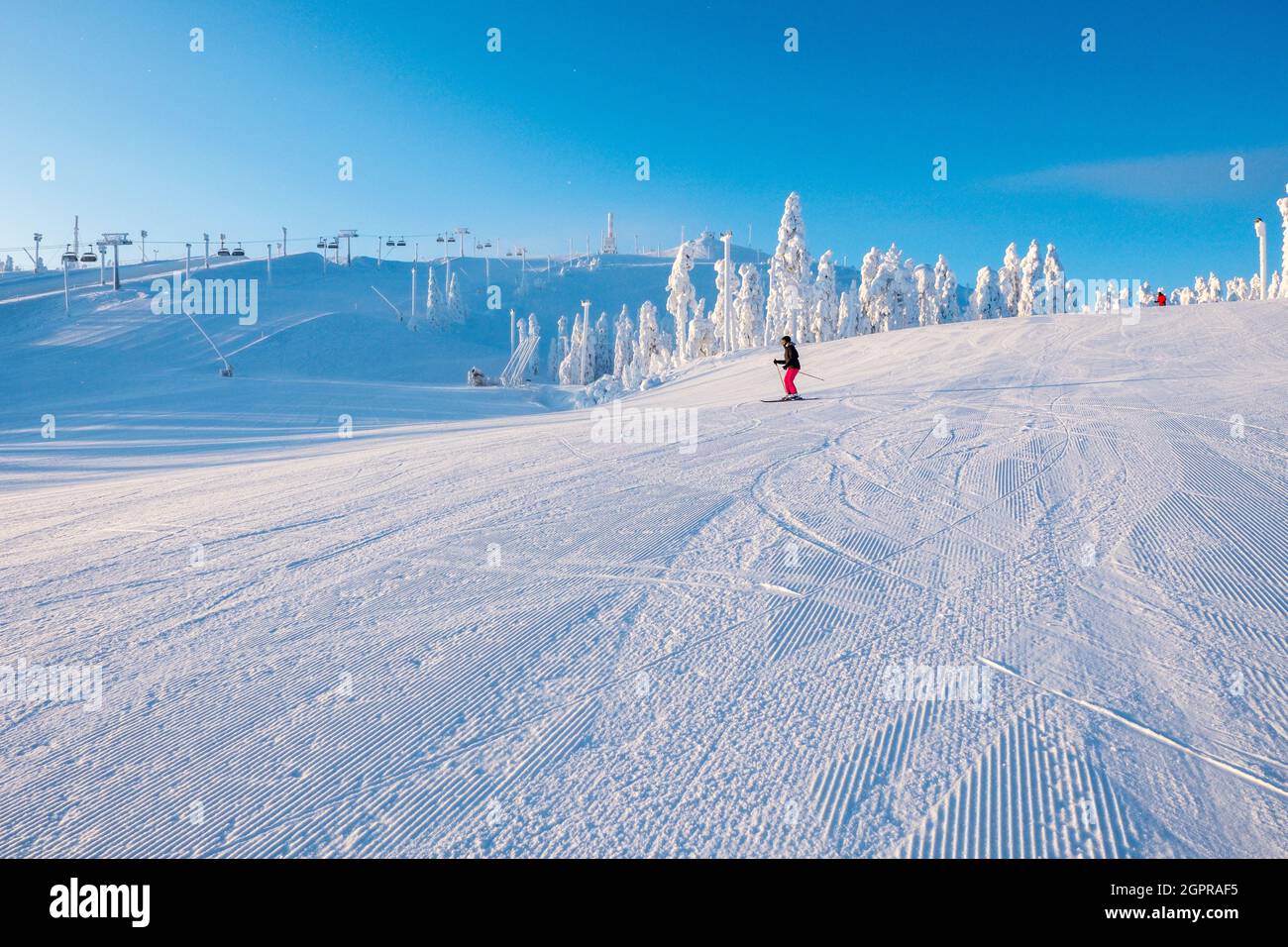 Skiing on uncrowded pistes at the Ruka ski resort in Lapland, Finland ...