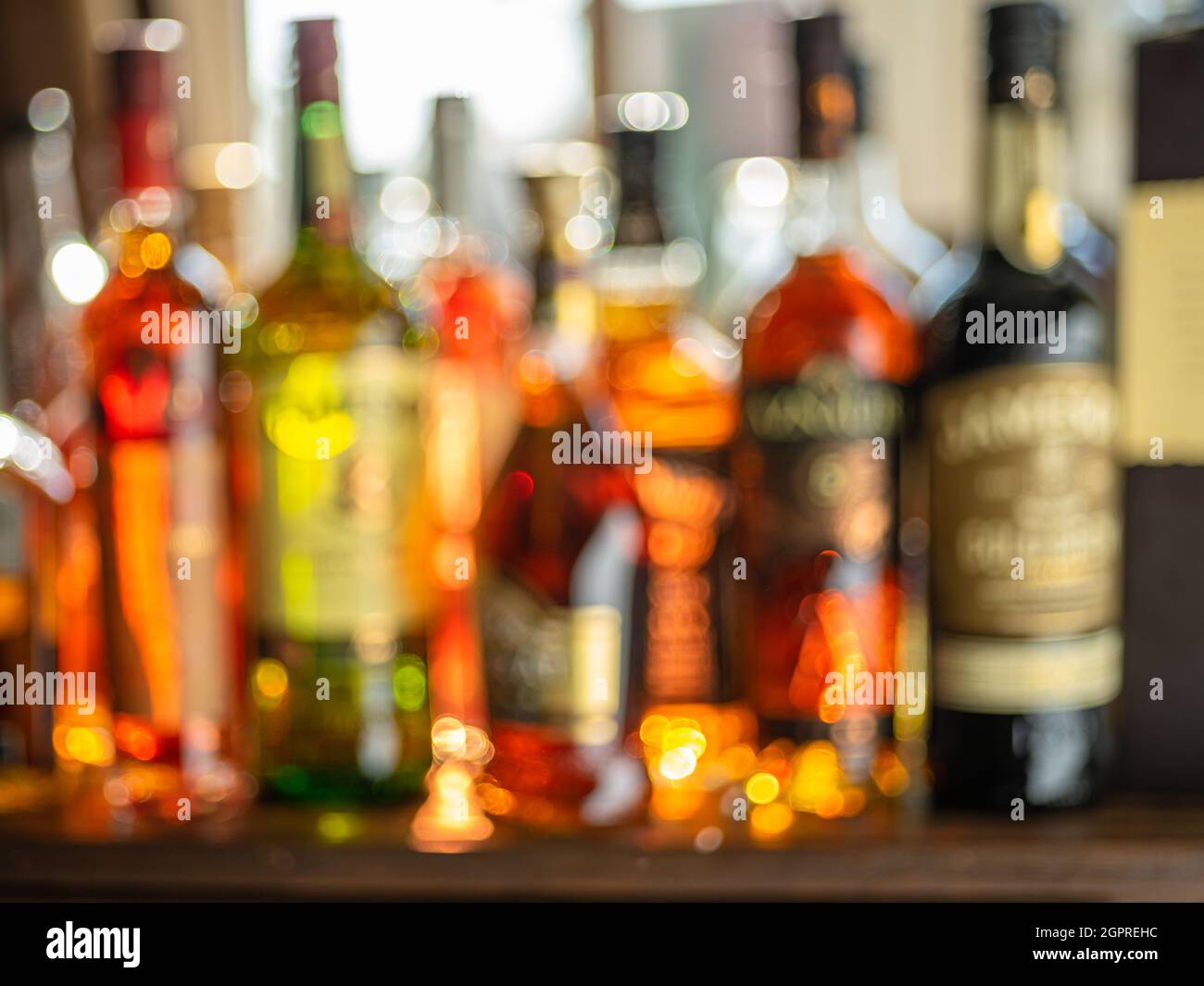 Beautiful bokeh from a row of alcoholic bottles in backlight Stock ...