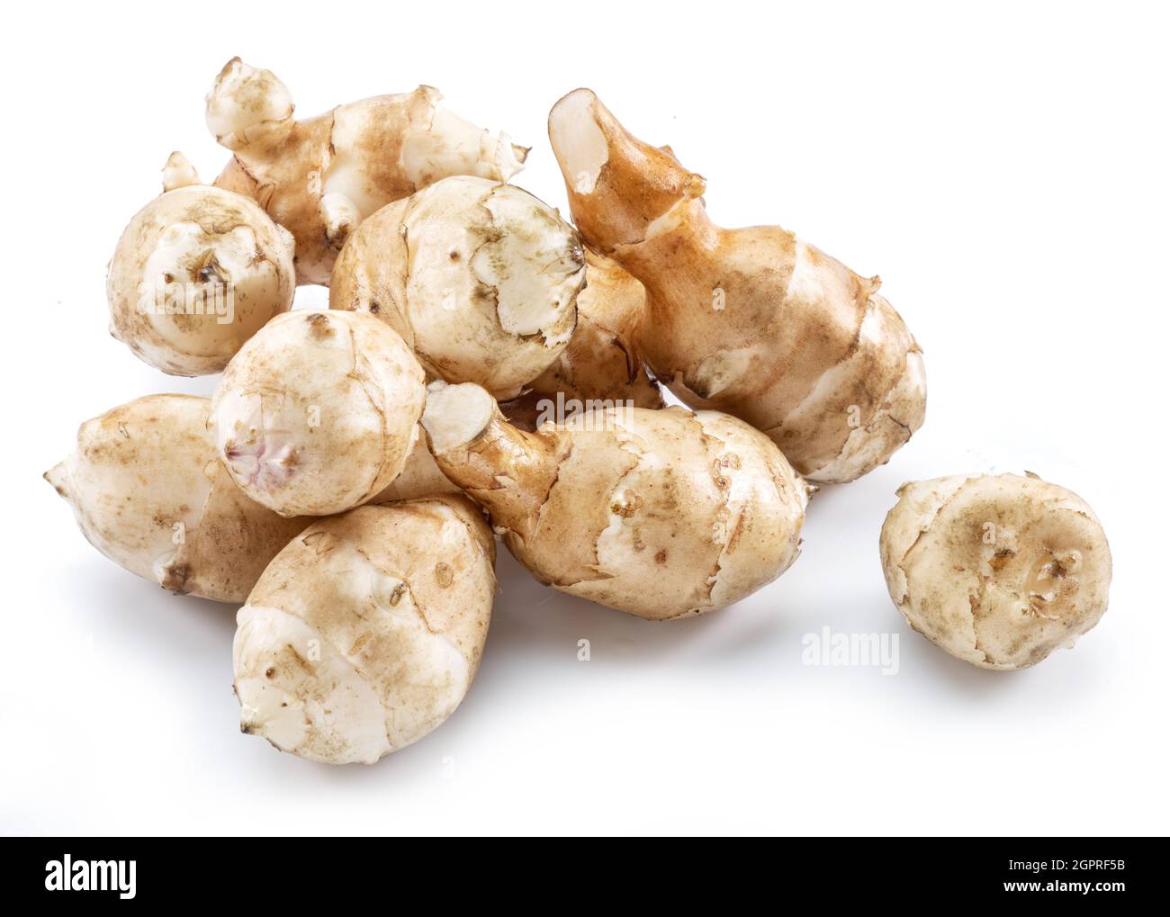 Jerusalem artichoke roots isolated on white background Stock Photo - Alamy