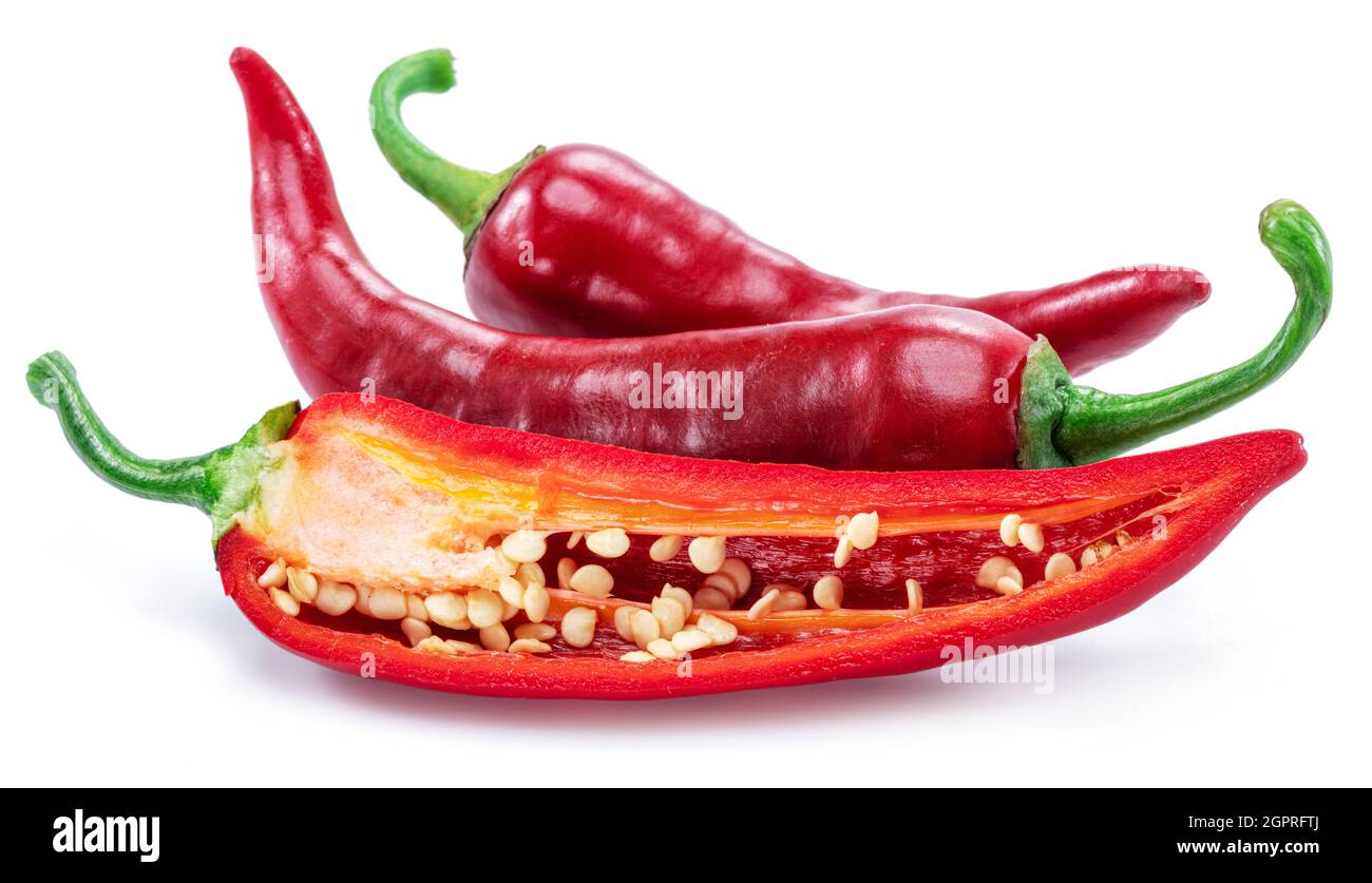 Fresh red chilli pepper and cross section of chilli pepper with seeds ...