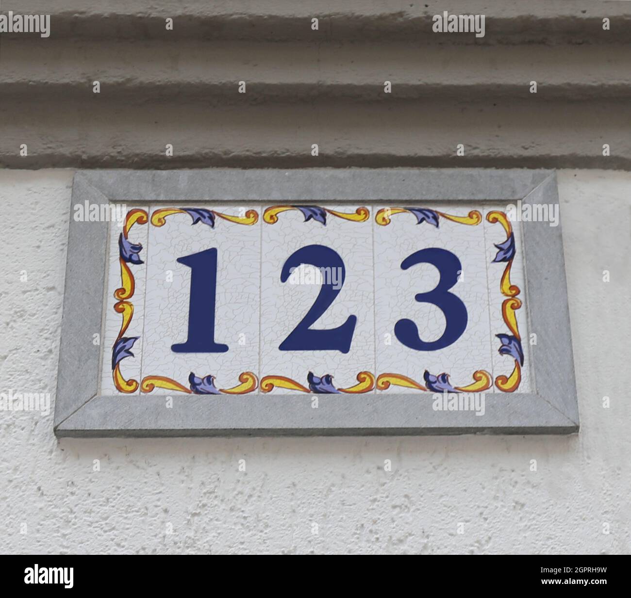 big number 123 of a house written on the ceramic tiles Stock Photo - Alamy