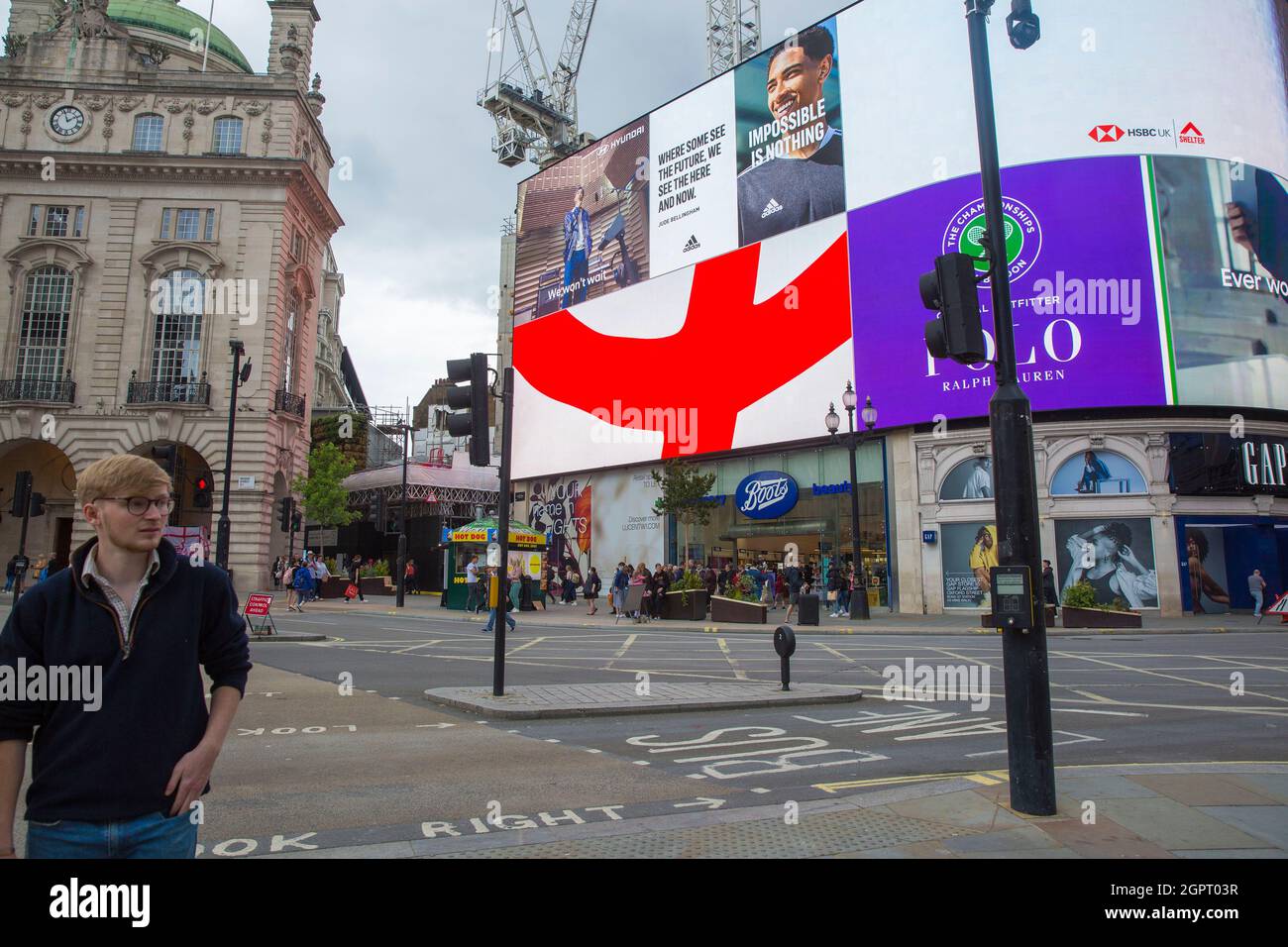 A Coca Cola advertisement supporting England is displayed on a large ...