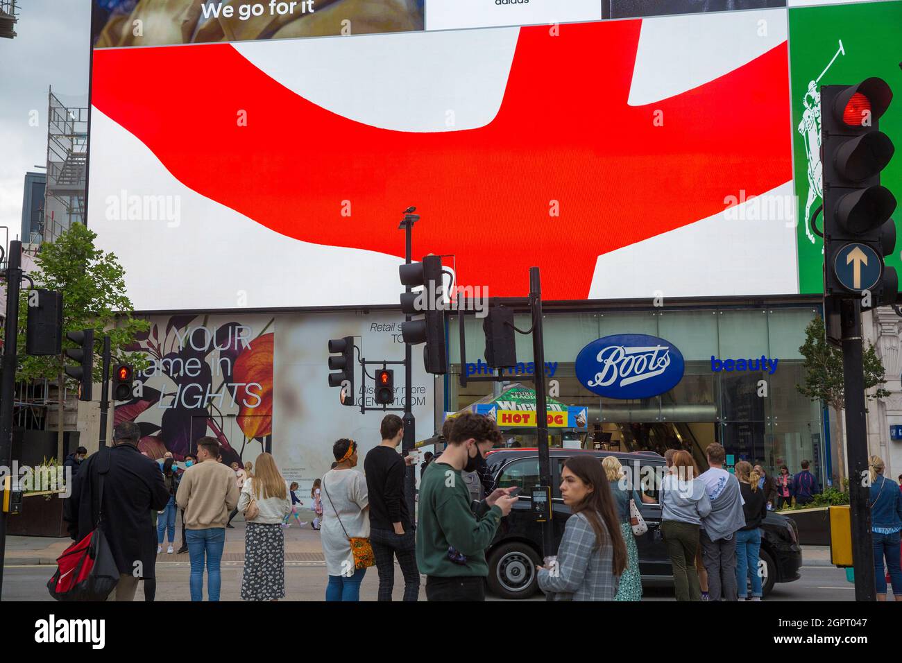 A Coca Cola advertisement supporting England is displayed on a large ...